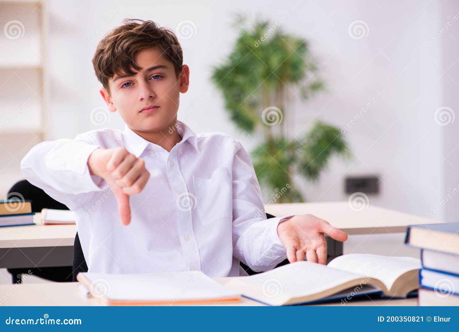 Schoolboy Preparing for Exams in the Classroom Stock Image - Image of ...
