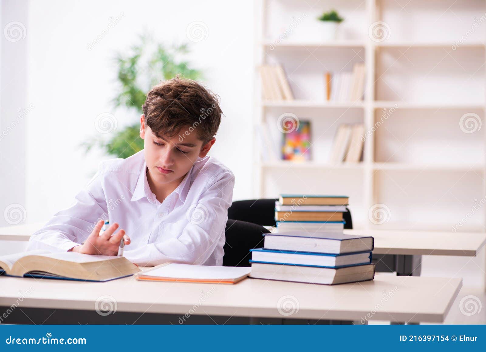 Schoolboy Preparing for Exams in the Classroom Stock Photo - Image of ...