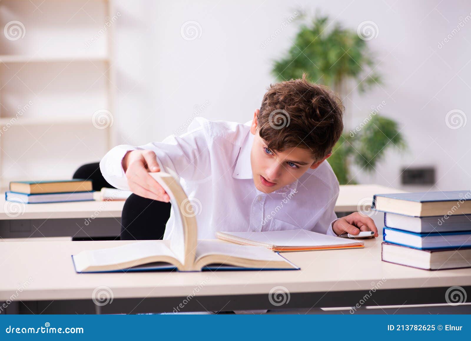 Schoolboy Preparing for Exams in the Classroom Stock Image - Image of ...