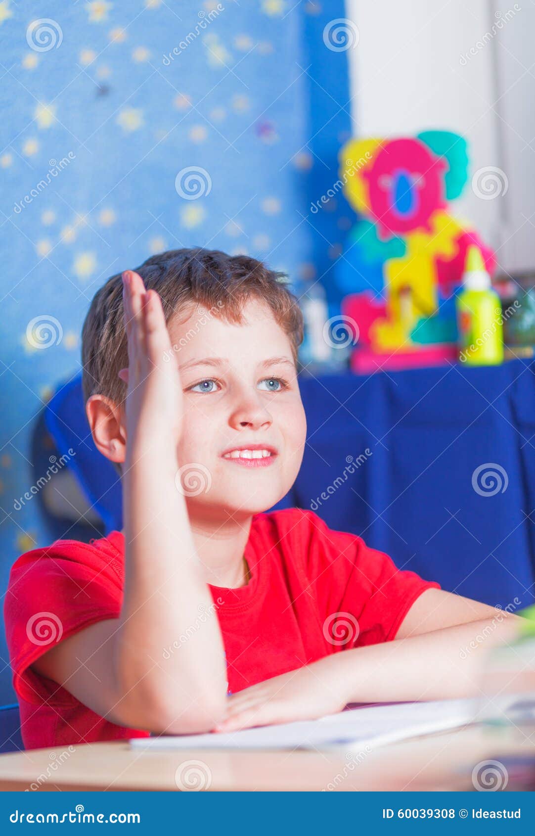 Schoolboy raise his hand stock photo. Image of student - 60039308