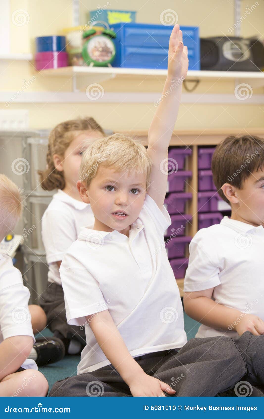 A Schoolboy Raises His Hand in a Primary Class Stock Photo - Image of ...