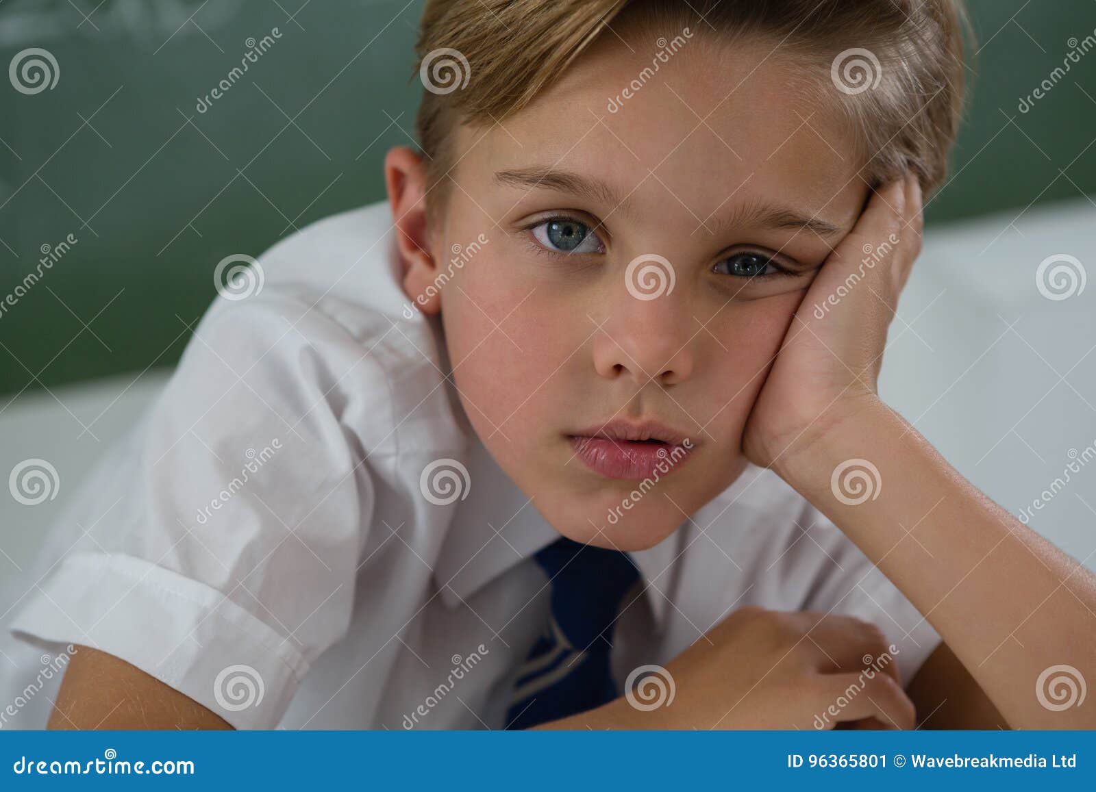 Schoolboy Relaxing in Classroom Stock Image - Image of innocence ...