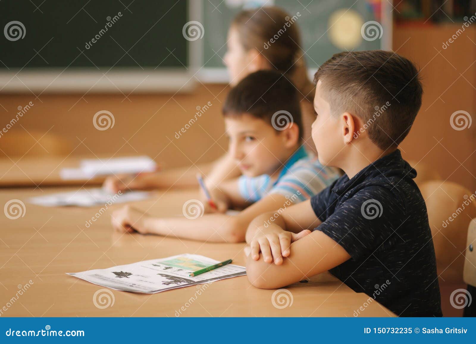 Schoolboy Rise Hand in Classroom. Elementary School Stock Image - Image ...