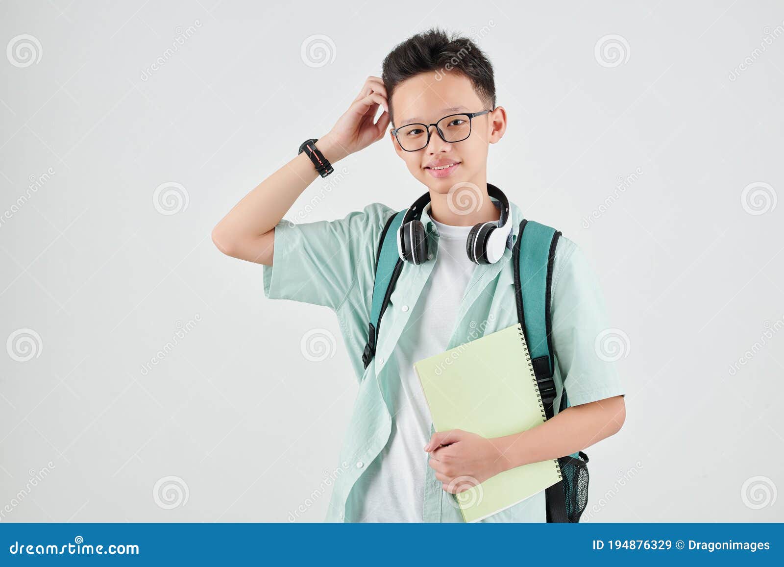 Schoolboy scratching head stock image. Image of teenager - 194876329