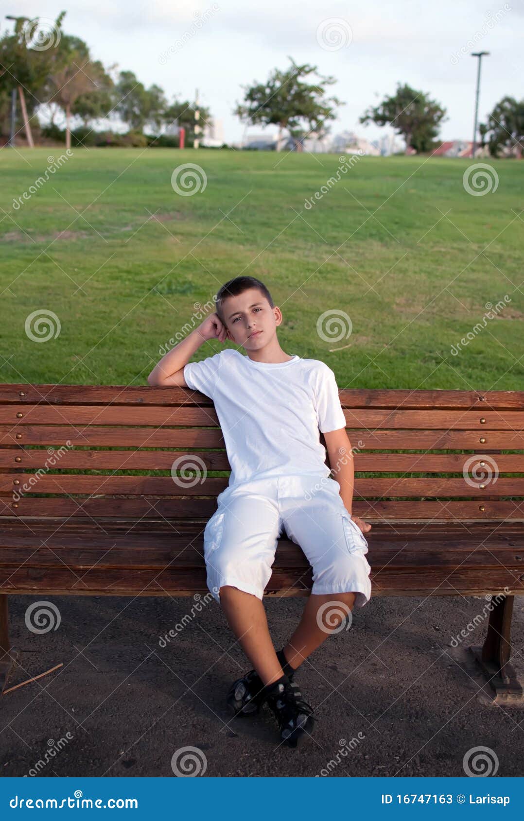 Schoolboy Sitting on Bench . Stock Image - Image of male, outdoor: 16747163