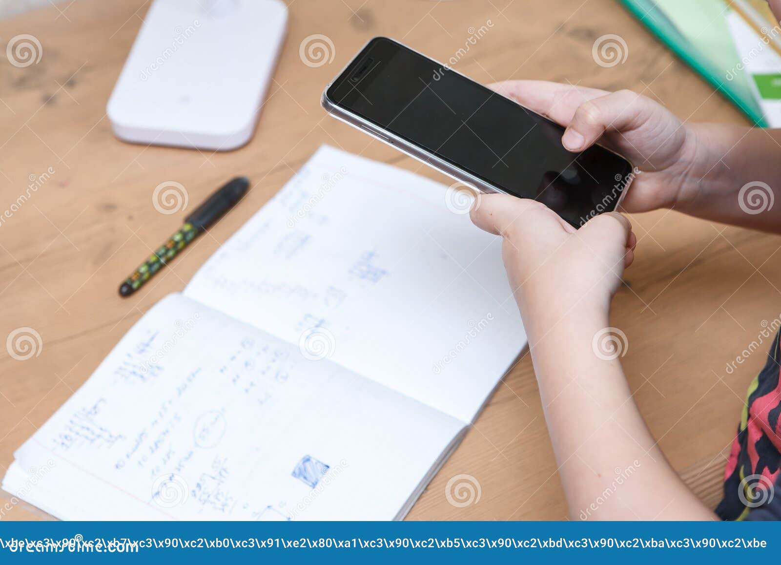 Schoolboy with Smartphone Doing Homework at Home Stock Photo - Image of ...