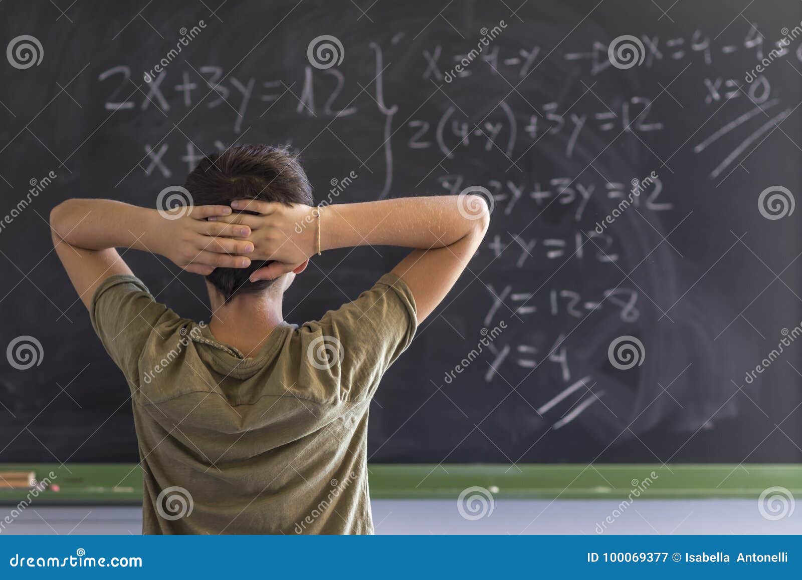 Schoolboy Solving a Problem on a Blackboard. Stock Image - Image of ...