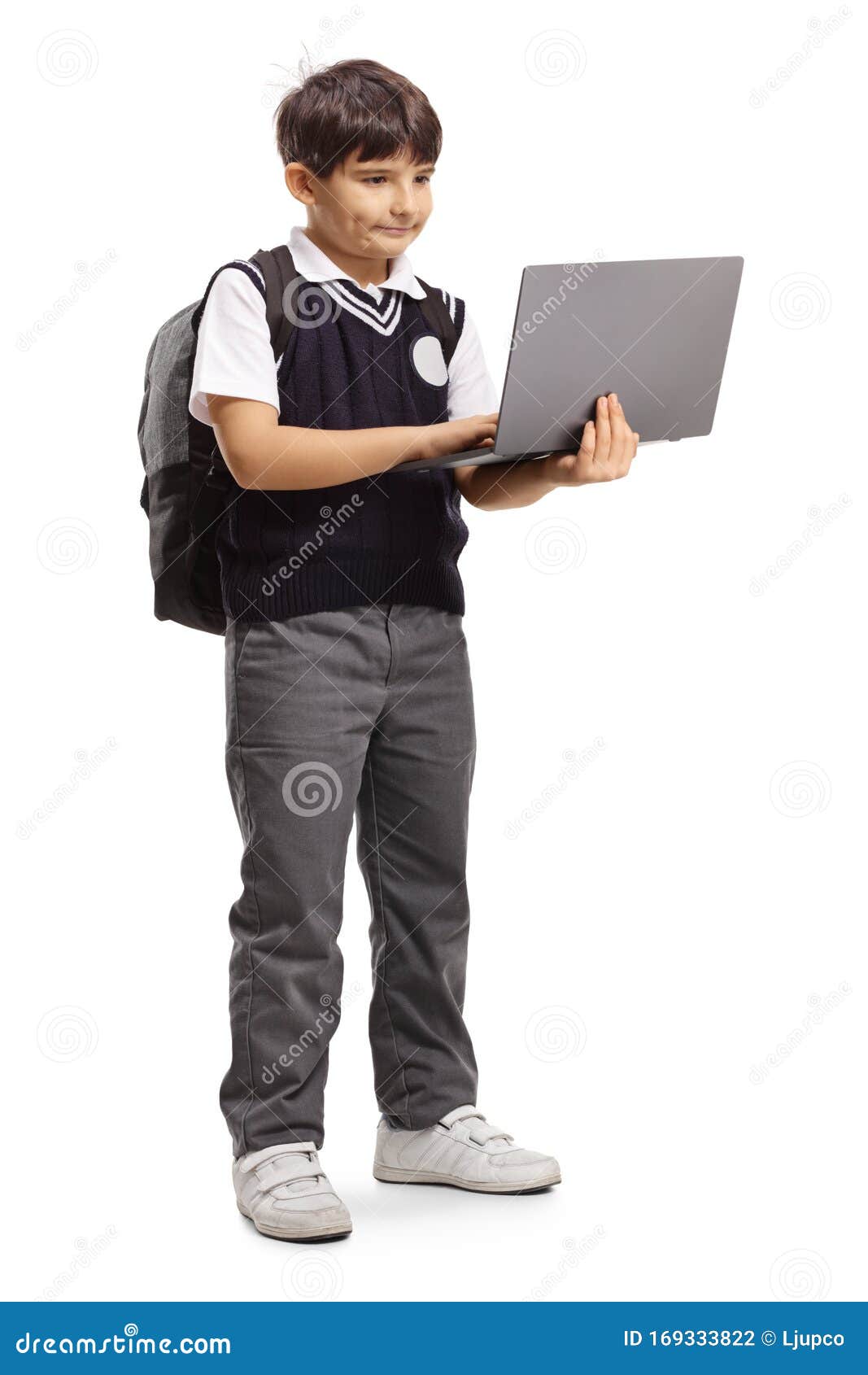 Schoolboy Standing and Using a Laptop Computer Stock Photo - Image of ...