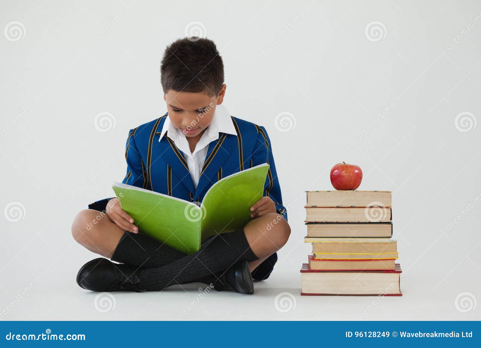 Schoolboy Studying Against White Background Stock Image - Image of ...