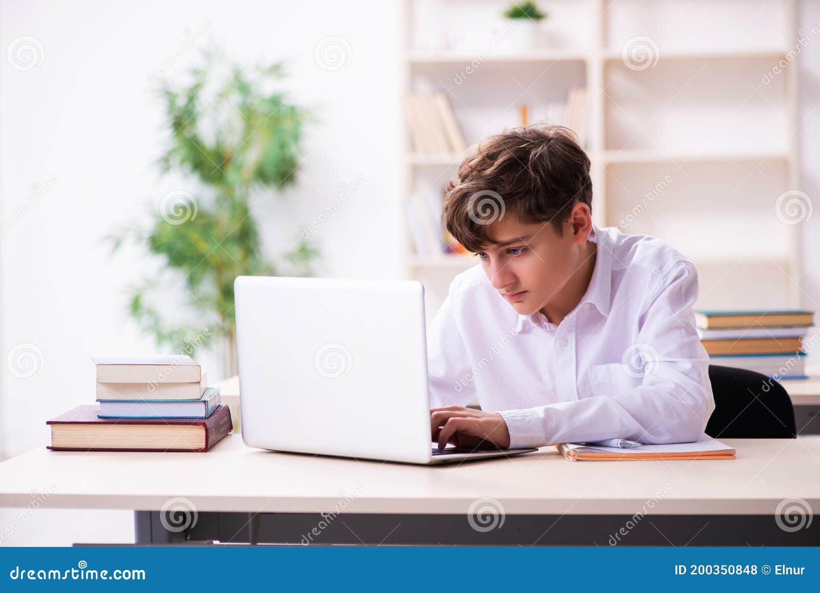 Schoolboy in Tele-education Concept in the Classroom Stock Photo ...