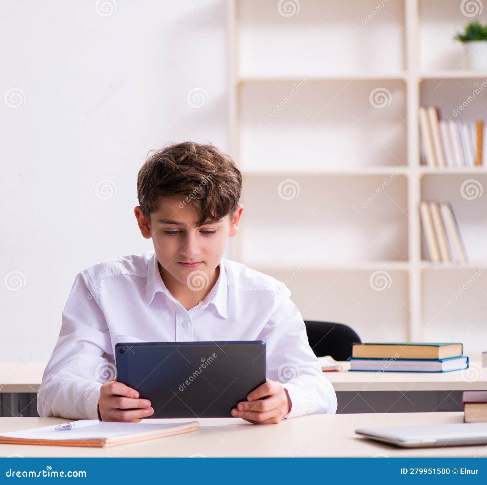 Schoolboy in Tele-education Concept in the Classroom Stock Photo ...