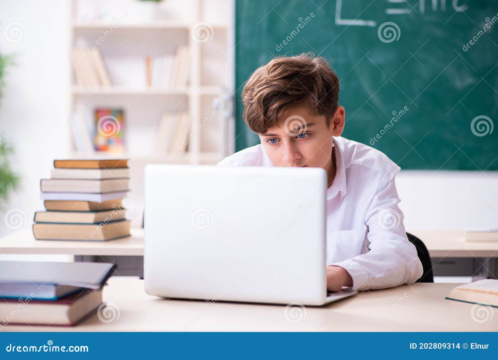 Schoolboy in Tele-education Concept in the Classroom Stock Photo ...
