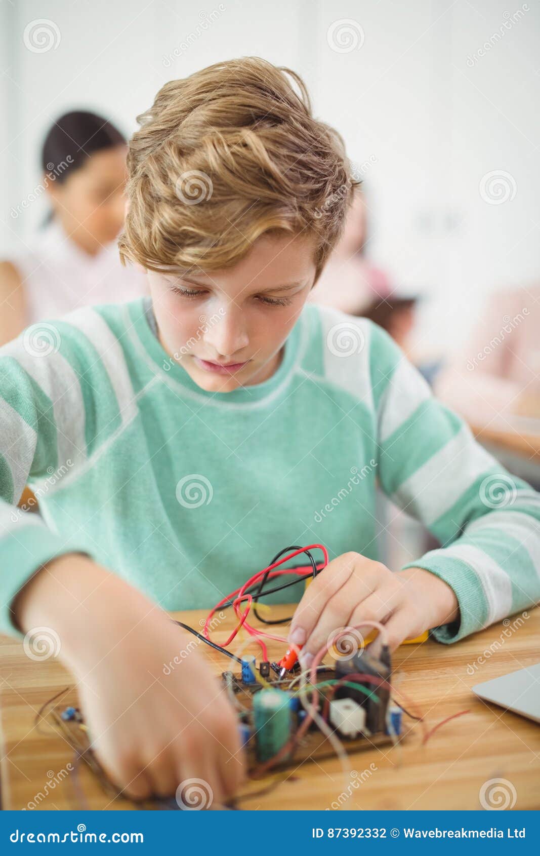 Schoolboy Working on Electronic Project in Classroom Stock Photo ...