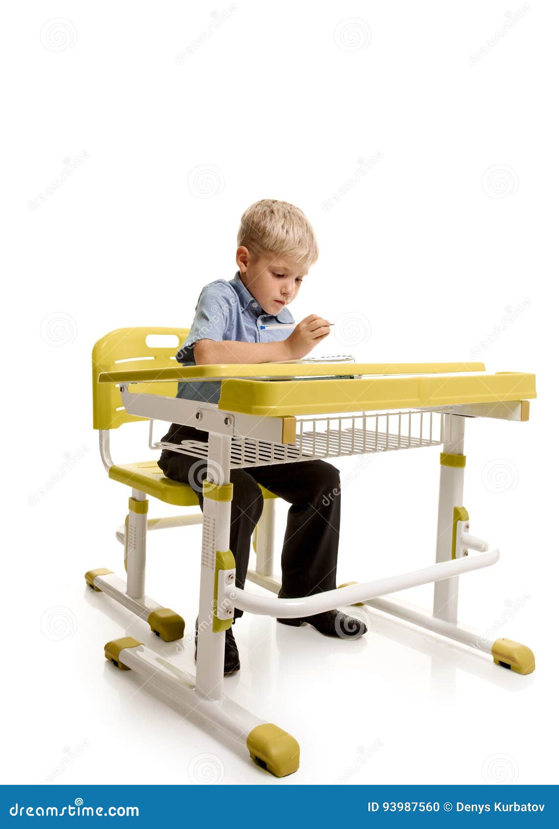 Schoolboy working on task stock photo. Image of knowledge - 93987560