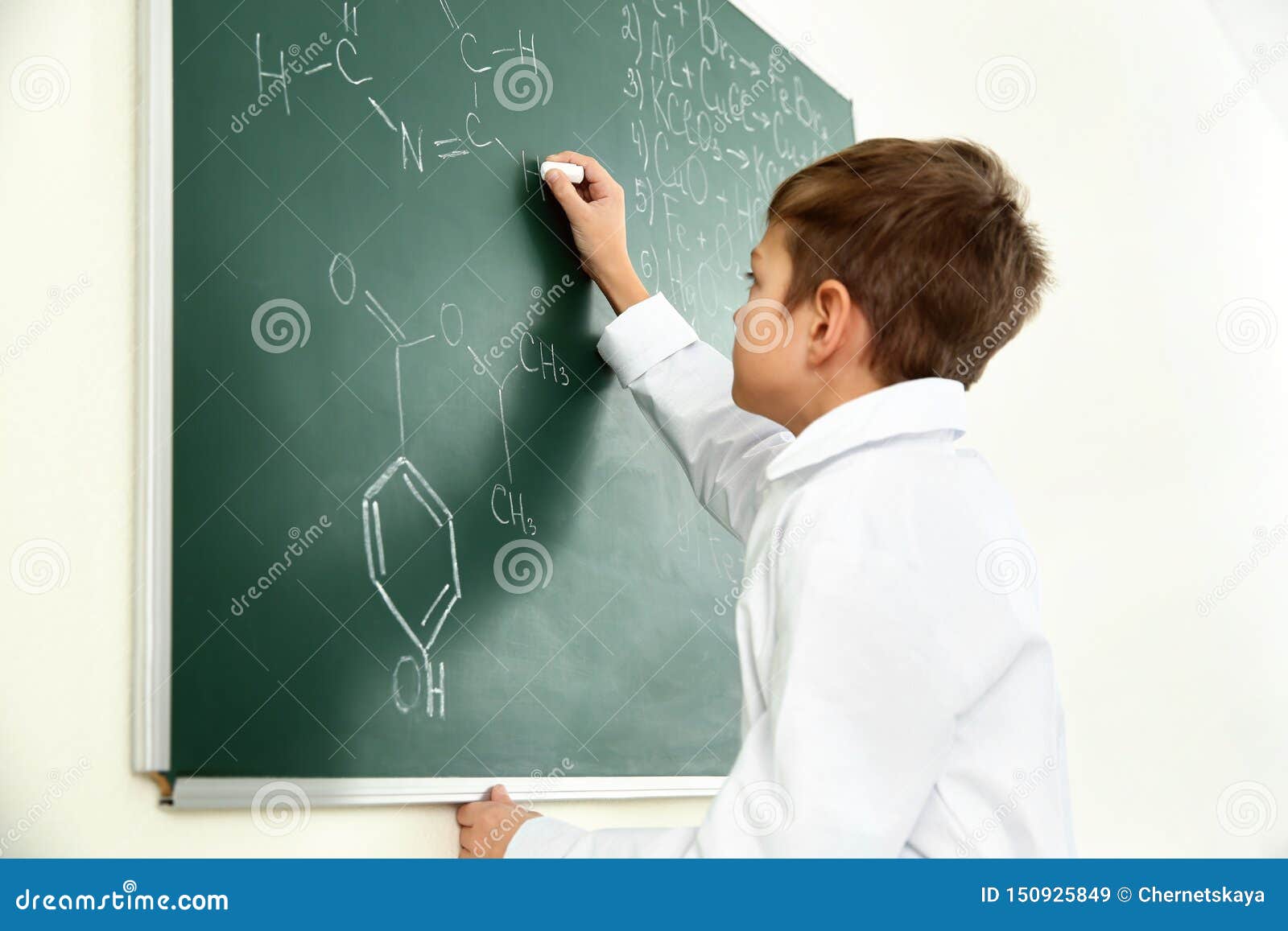 Schoolboy Writing Formula on Blackboard in Class Stock Image - Image of ...
