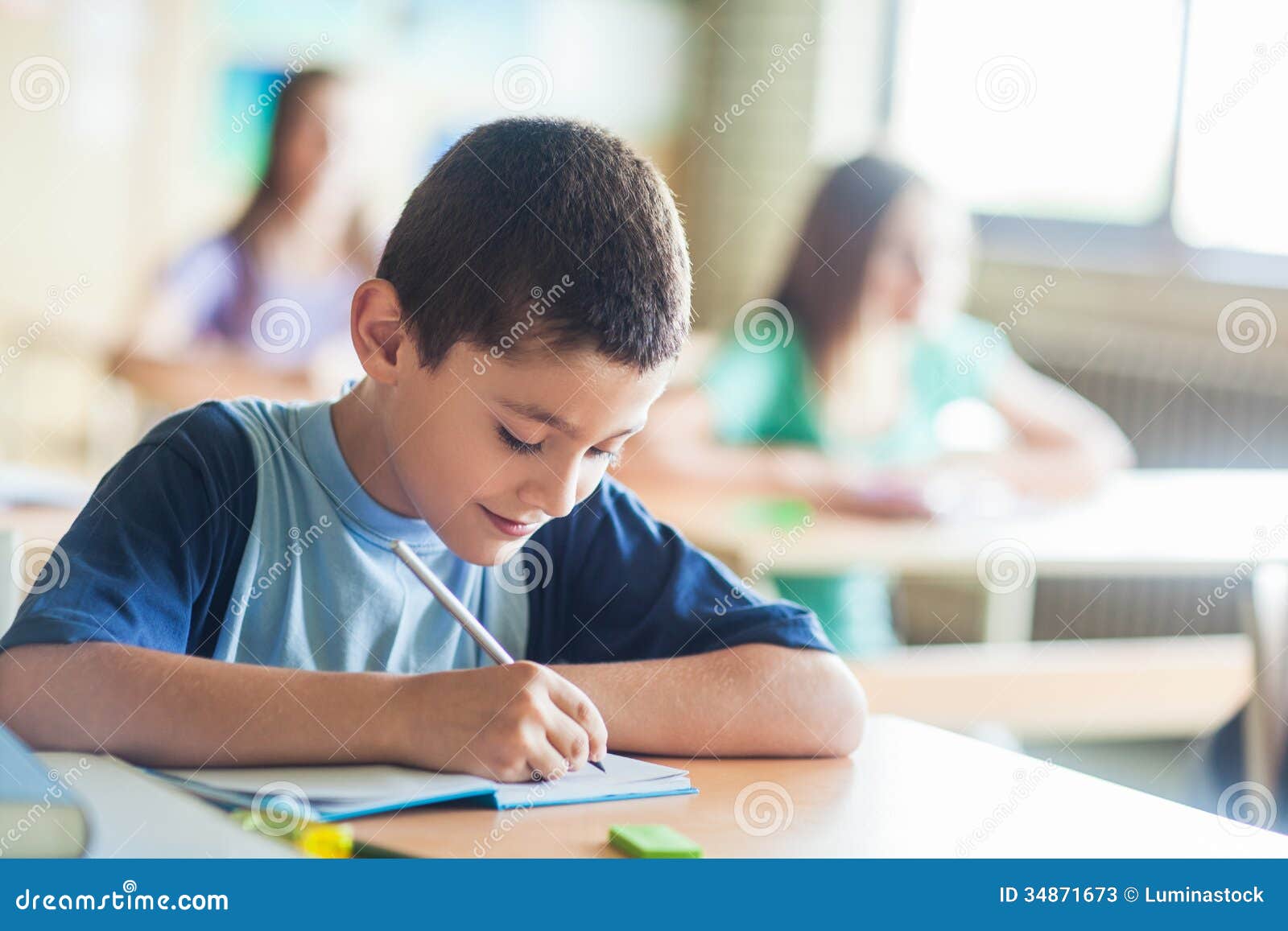Schoolboy Writing Notes stock image. Image of cheerful - 34871673