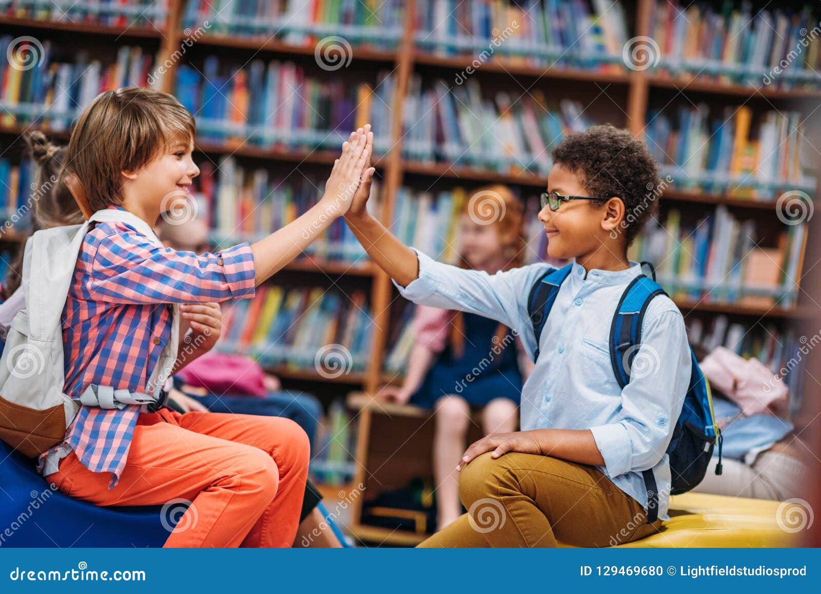 Schoolboys Giving High Five Stock Photo - Image of beautiful ...