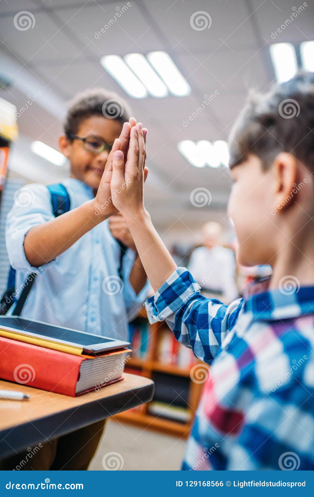 Close-up Shot of Schoolboys Giving High Five Stock Photo - Image of ...