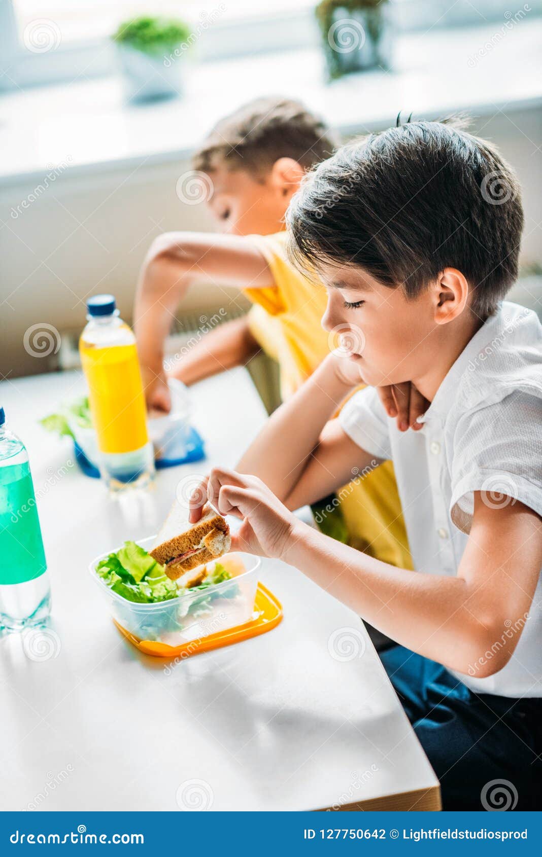 Schoolboys Taking Lunch Together at School Stock Photo - Image of lunch ...