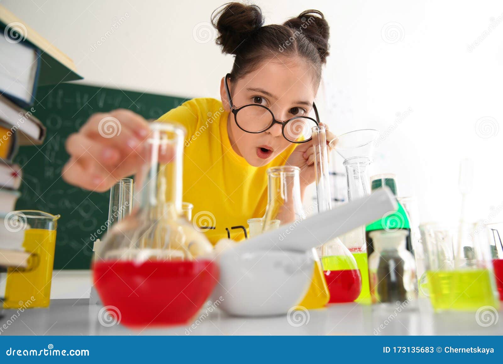 Schoolchild Making Experiment at Table in Class Stock Image - Image of ...