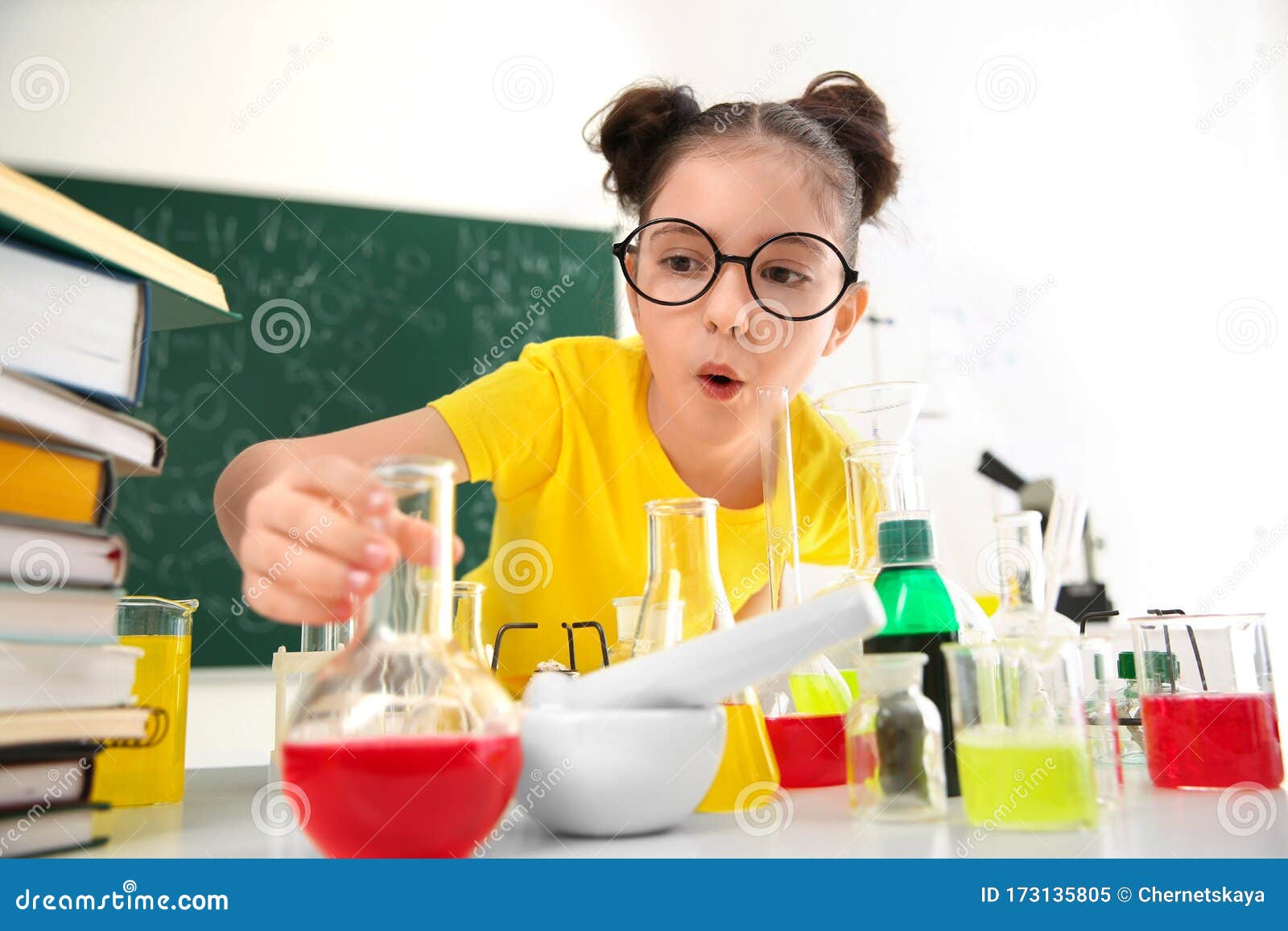 Schoolchild Making Experiment at Table in Class Stock Image - Image of ...