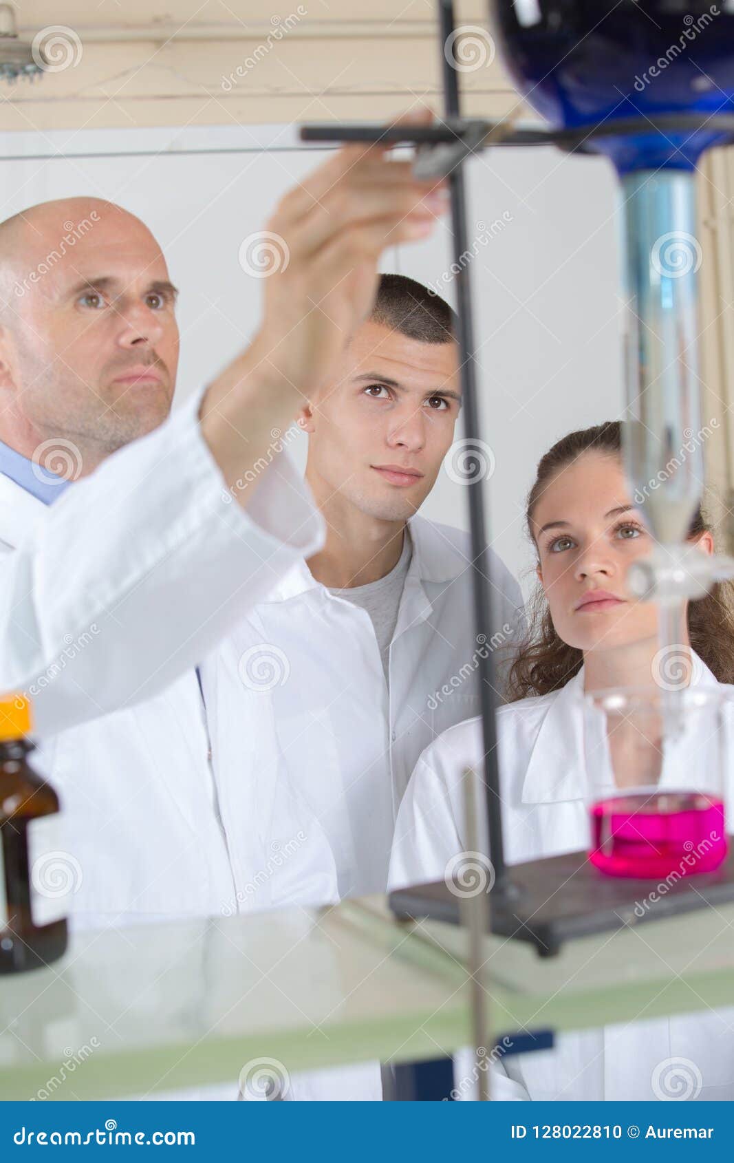 Schoolchildren Doing Chemistry Experiment in Science Class Stock Photo ...