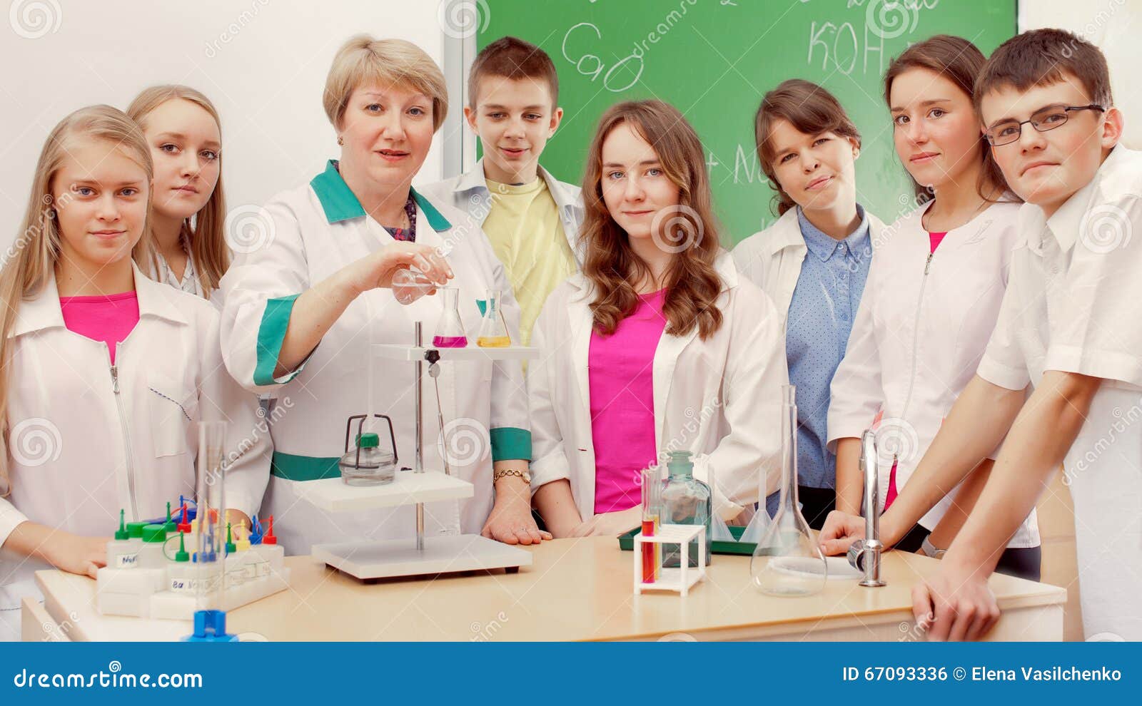 Schoolchildren Doing Experiment in Science Class Stock Photo - Image of ...