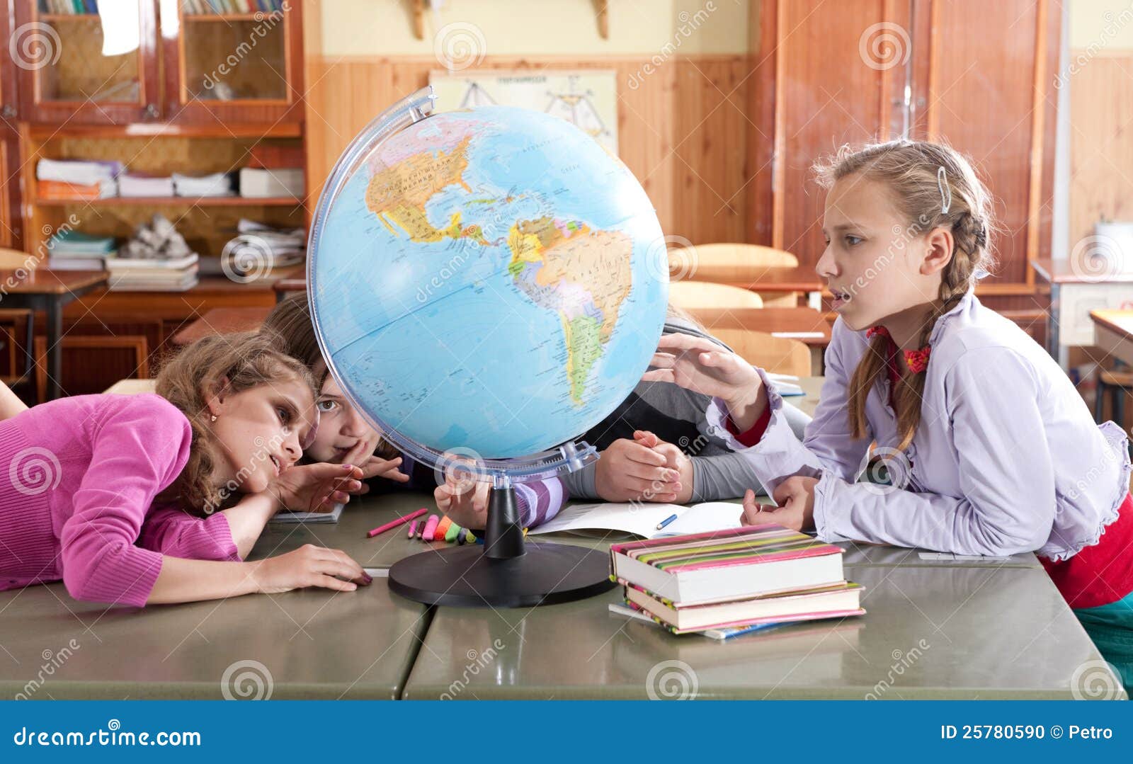 Schoolchildren Exploring Globe In Classroom Stock Photo | CartoonDealer ... Schoolchildren Exploring Globe In Classroom Stock Photo | CartoonDealer ...