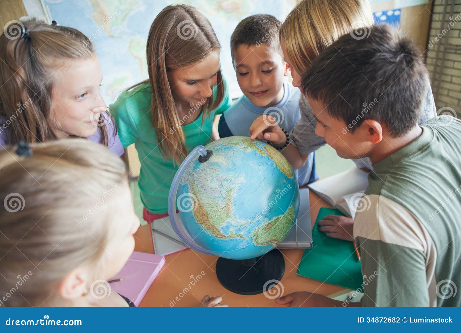 Schoolchildren in a Geography Lesson Stock Photo - Image of globe ...