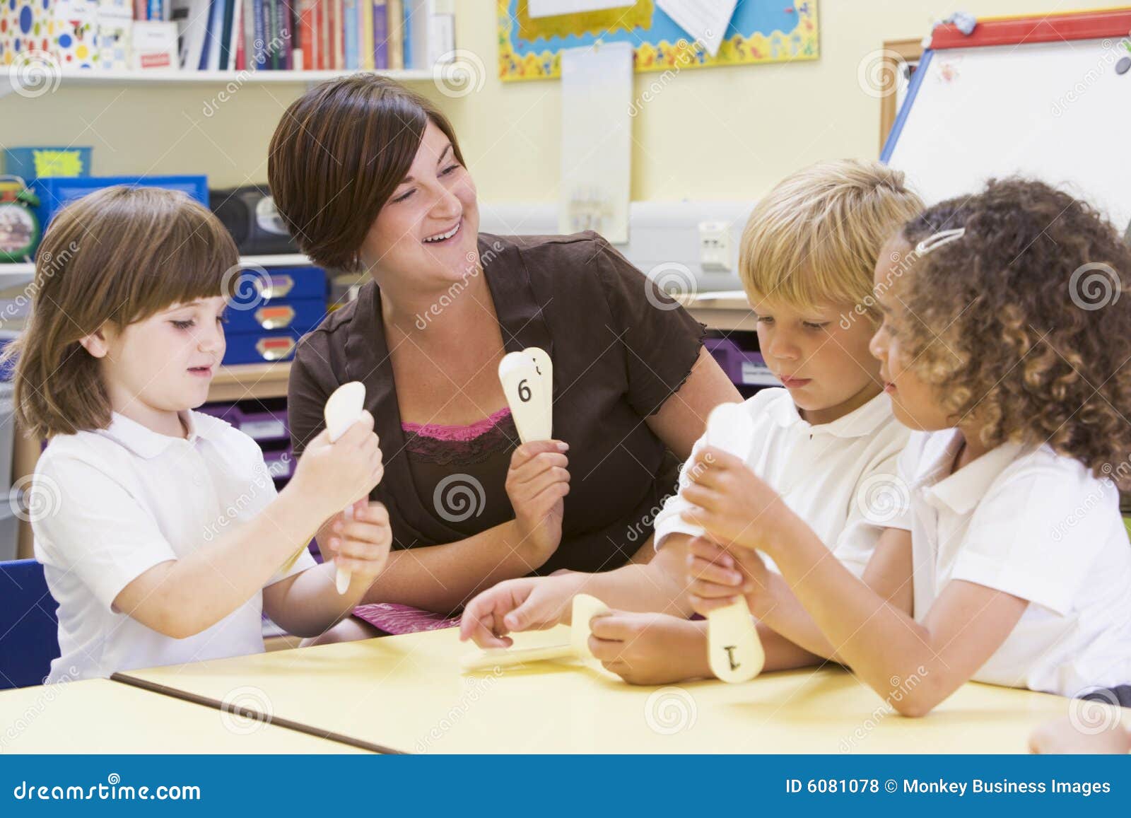 Schoolchildren Learning Numbers with Their Teacher Stock Photo - Image ...