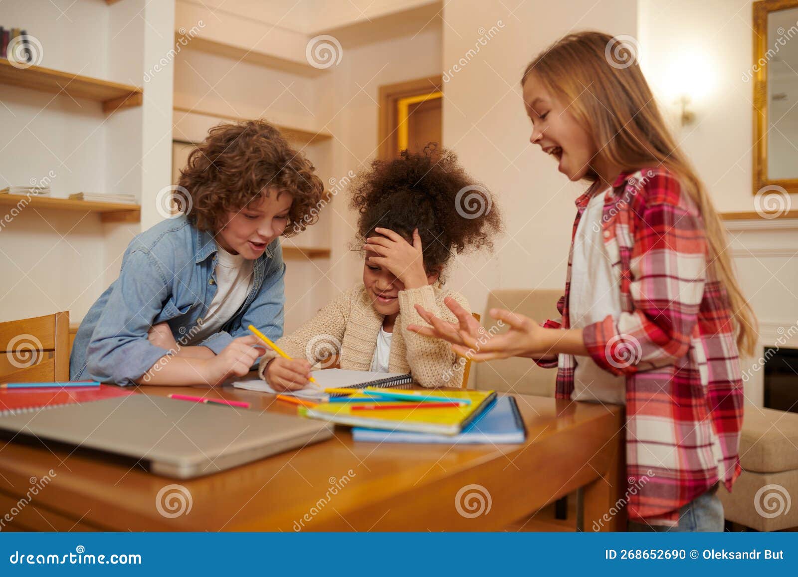 Schoolchildren Preparing Lessons Together and Discussing the Tasks ...