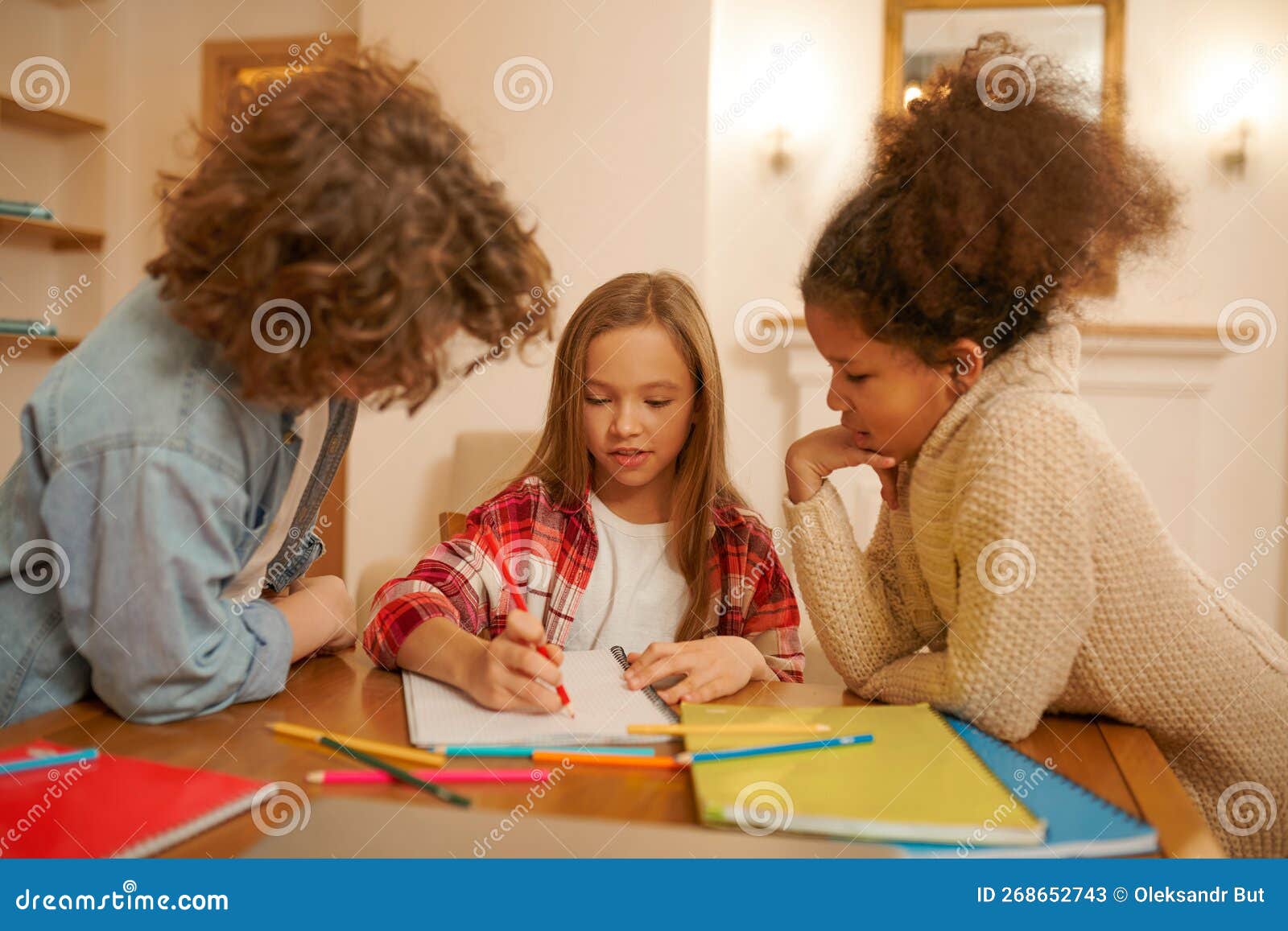 Schoolchildren Preparing Lessons Together and Discussing the Tasks ...