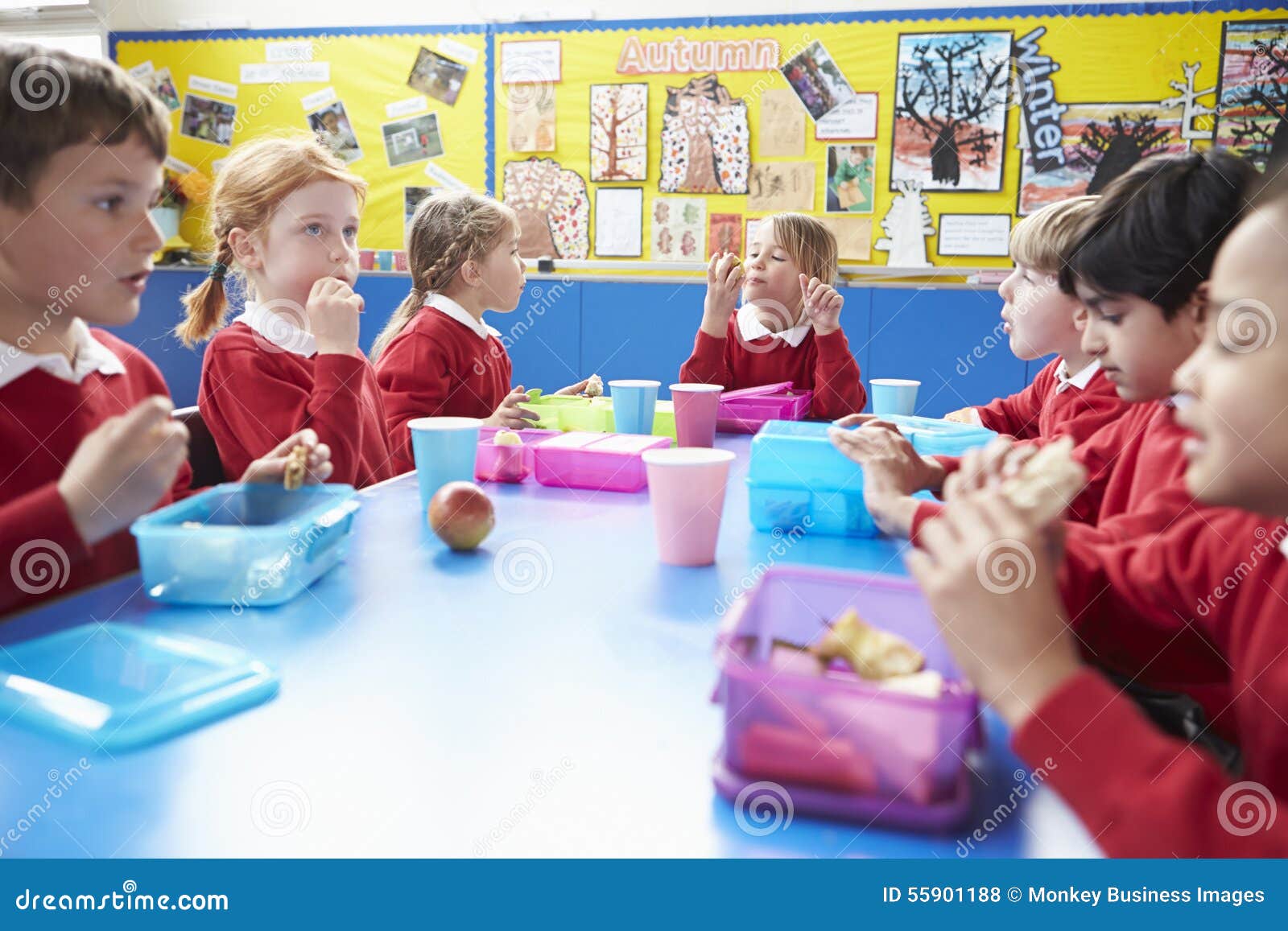 Schoolchildren Sitting at Table Eating Packed Lunch Stock Photo - Image ...