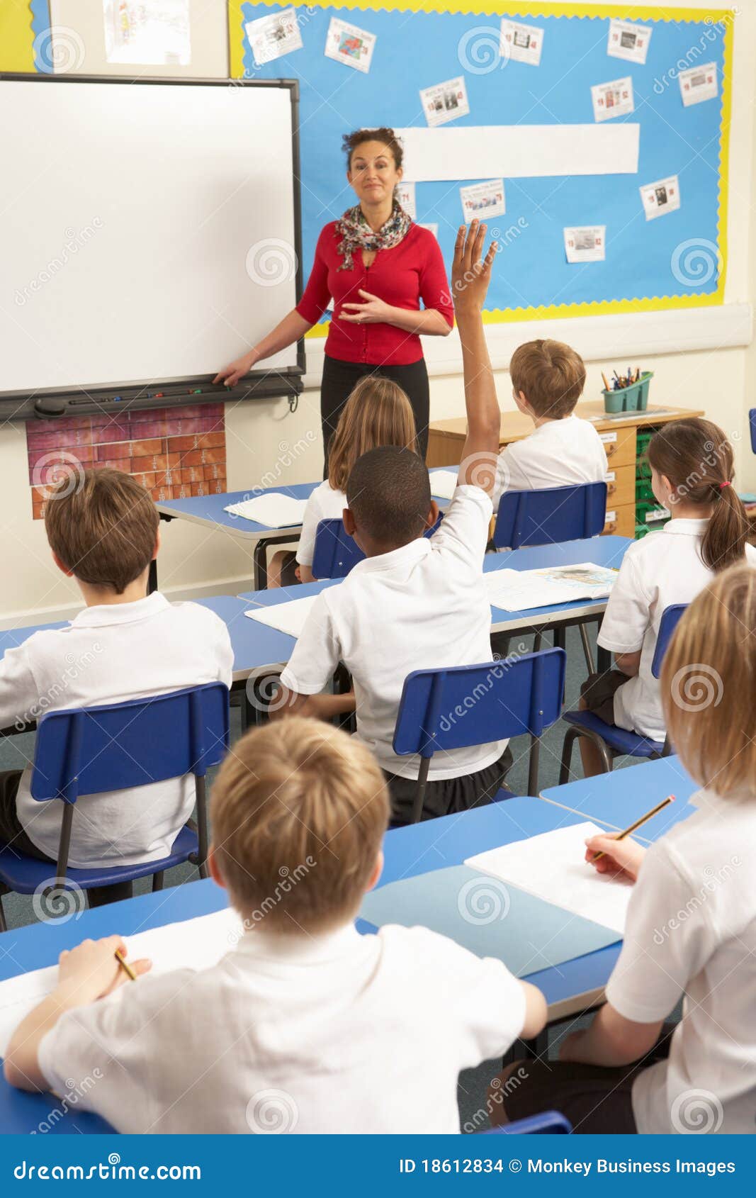 Schoolchildren Studying in Classroom with Teacher Stock Photo - Image ...