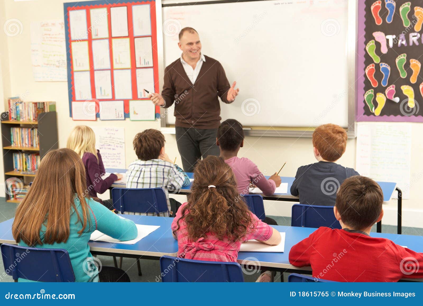 Schoolchildren Studying in Classroom with Teacher Stock Image - Image ...