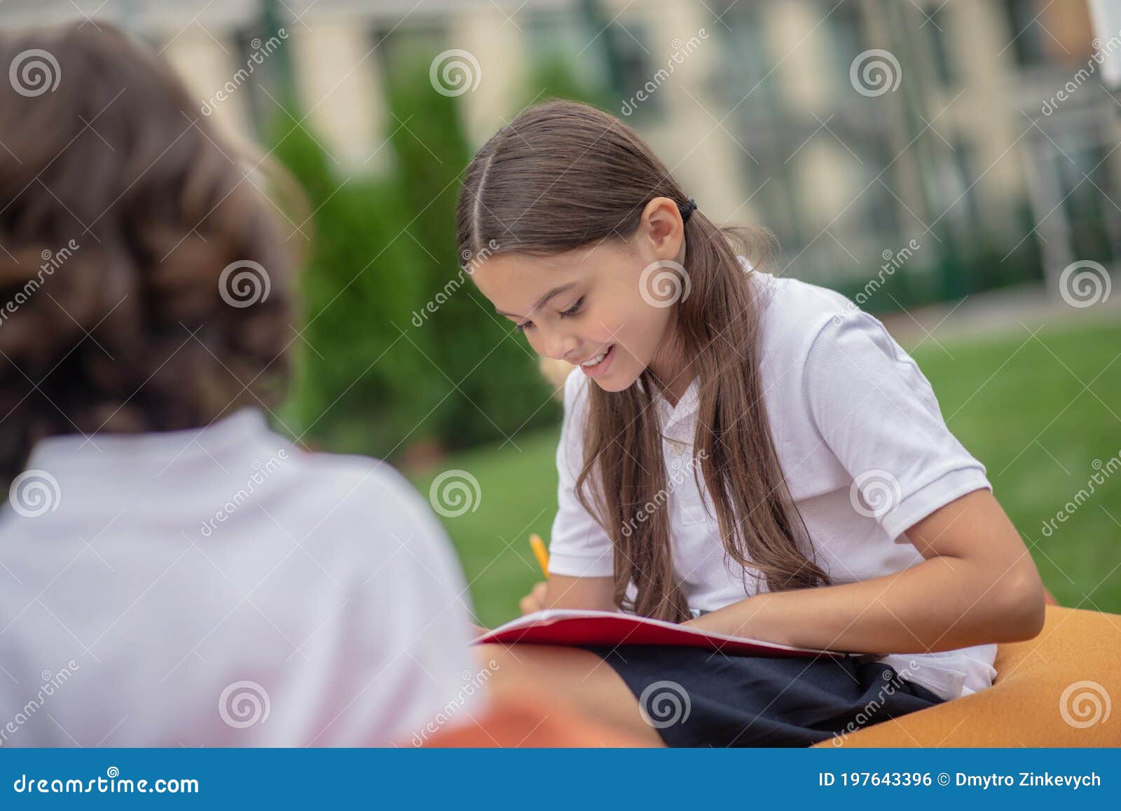 Schoolchildren Studying Together and Looking Busy Stock Photo - Image ...