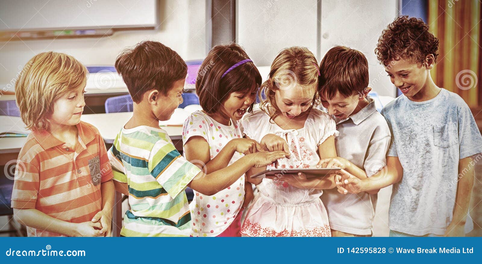Schoolchildren Using Digital Tablet Stock Photo - Image of cheerful ...