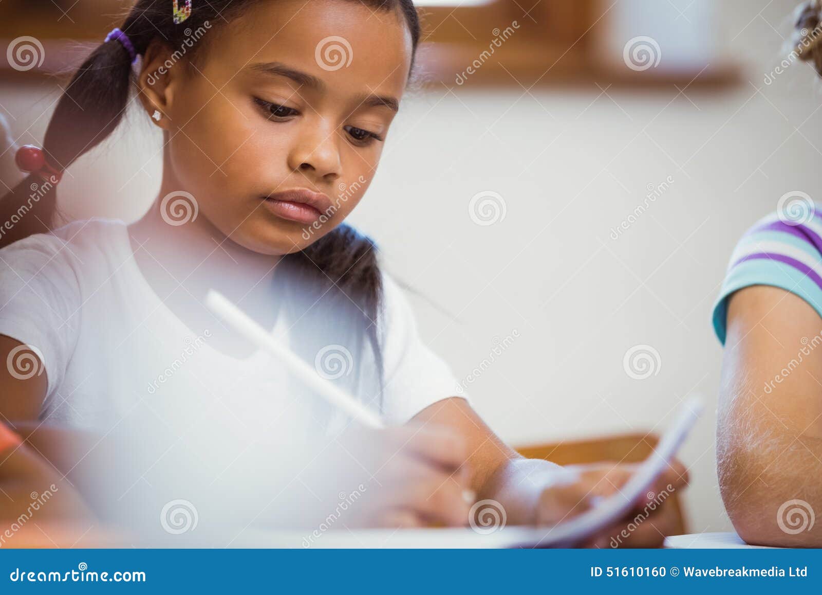 Schoolchildren Working Hard at Desk Stock Photo - Image of indoors ...