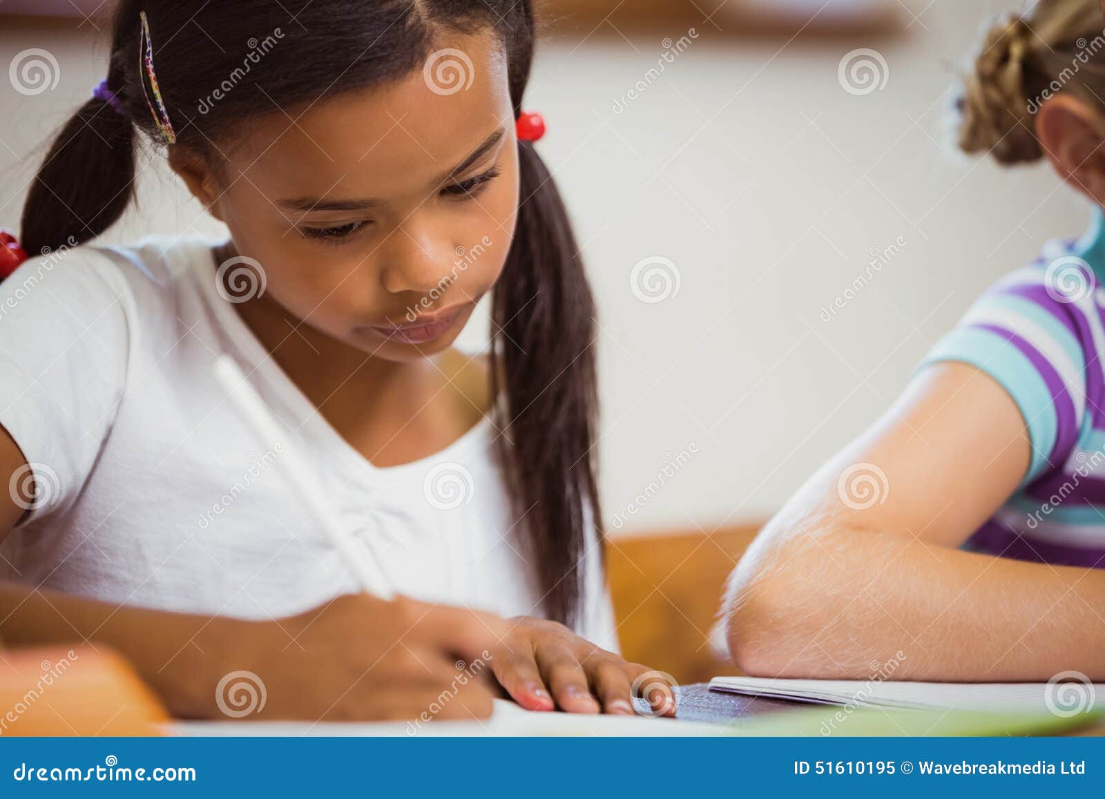 Schoolchildren Working Hard at Desk Stock Image - Image of female ...
