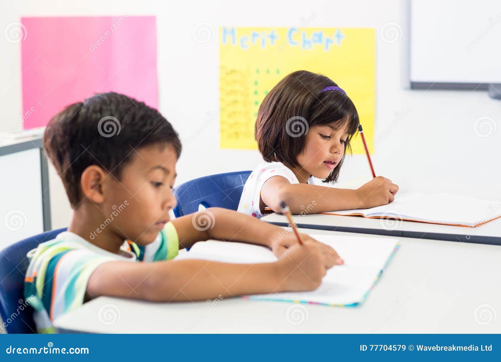 Schoolchildren Writing on Books Stock Image - Image of knowledge, head ...
