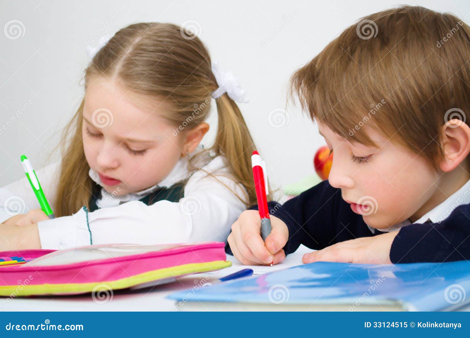 Schoolchildren Writing in Workbook Stock Image - Image of happiness ...