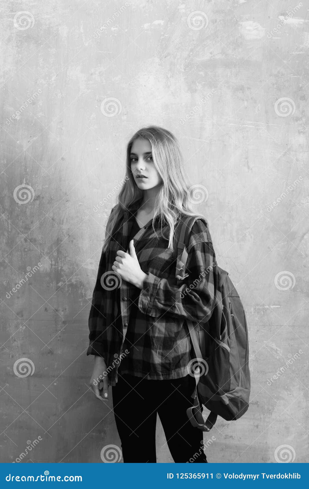Schoolgirl Or Young Girl In Red Checkered Shirt With Backpack Stock