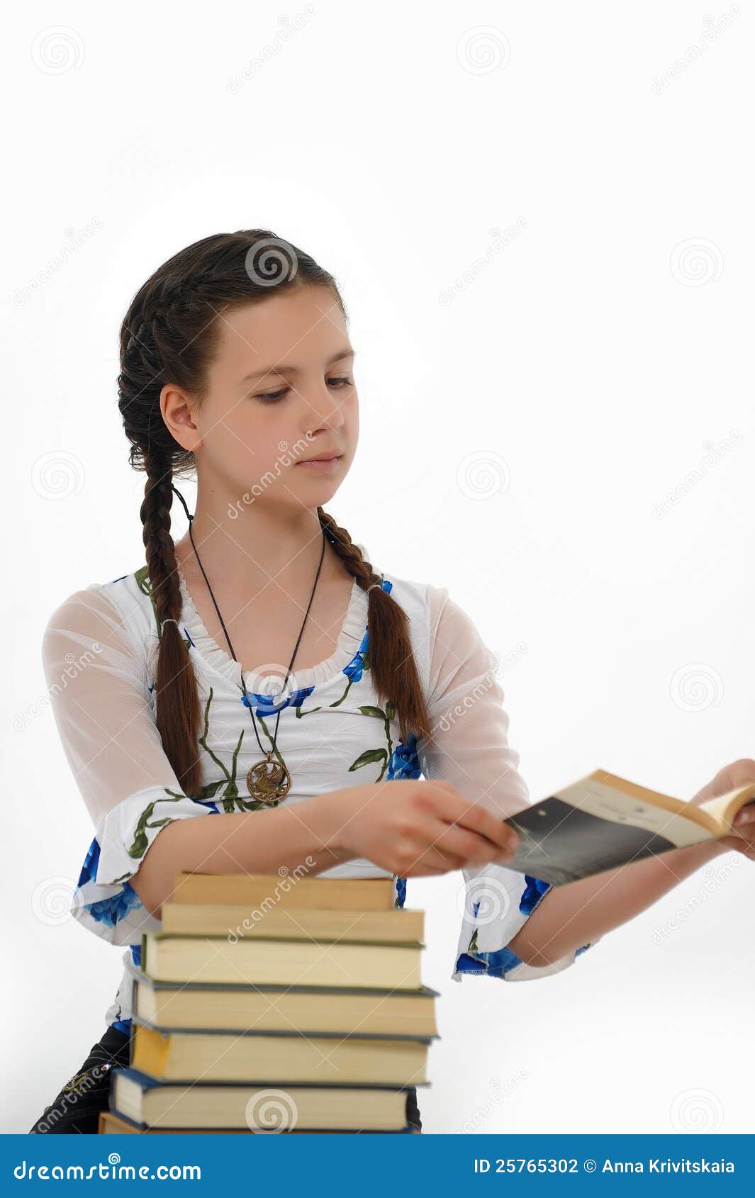 Schoolgirl with books stock photo. Image of learning - 25765302