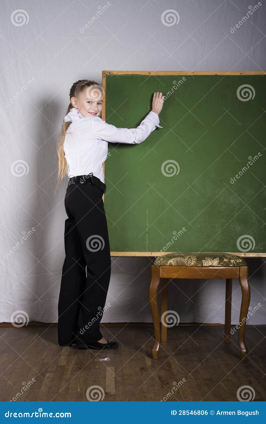 Schoolgirl with Chalkboard in Studio Stock Photo - Image of board ...
