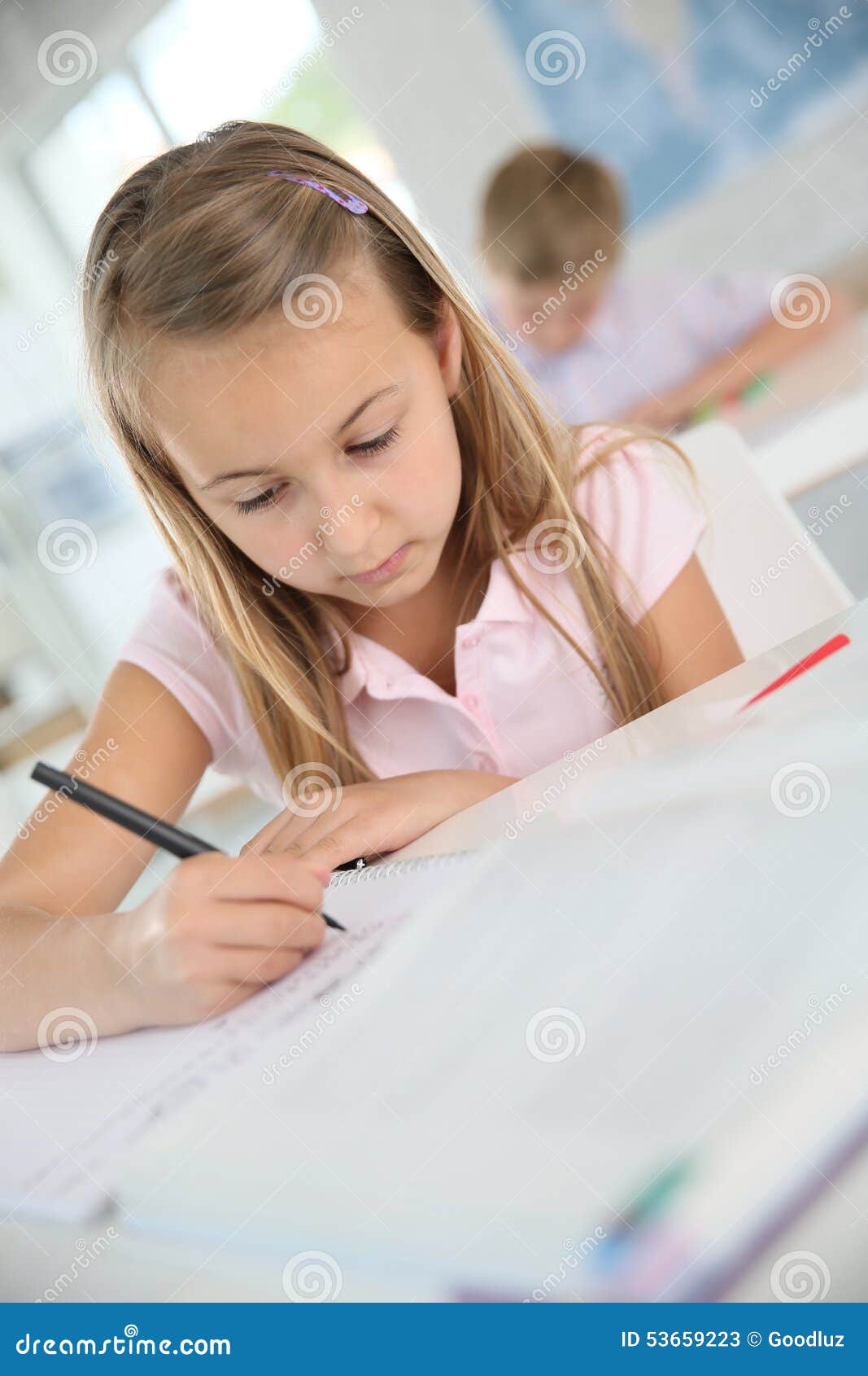 Schoolgirl in Class Wirting Stock Image - Image of happy, school: 53659223