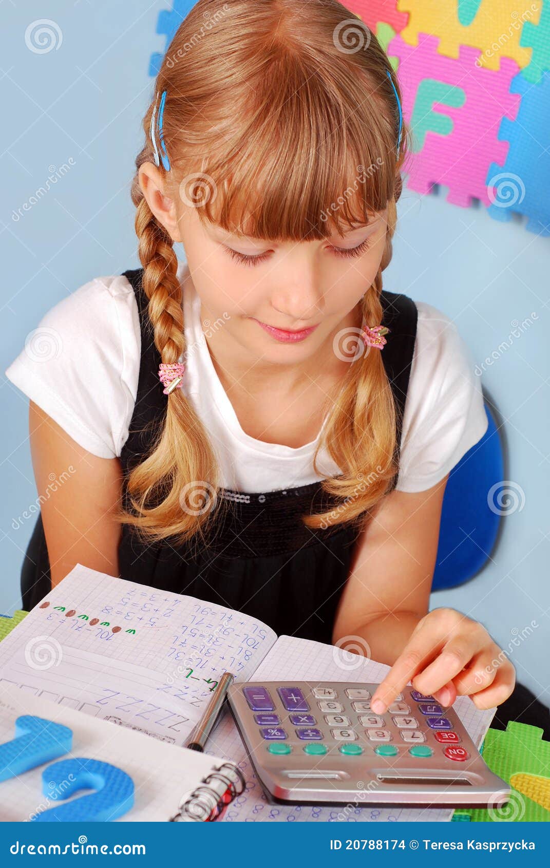 Schoolgirl Counting with Calculator Stock Photo - Image of notebook ...
