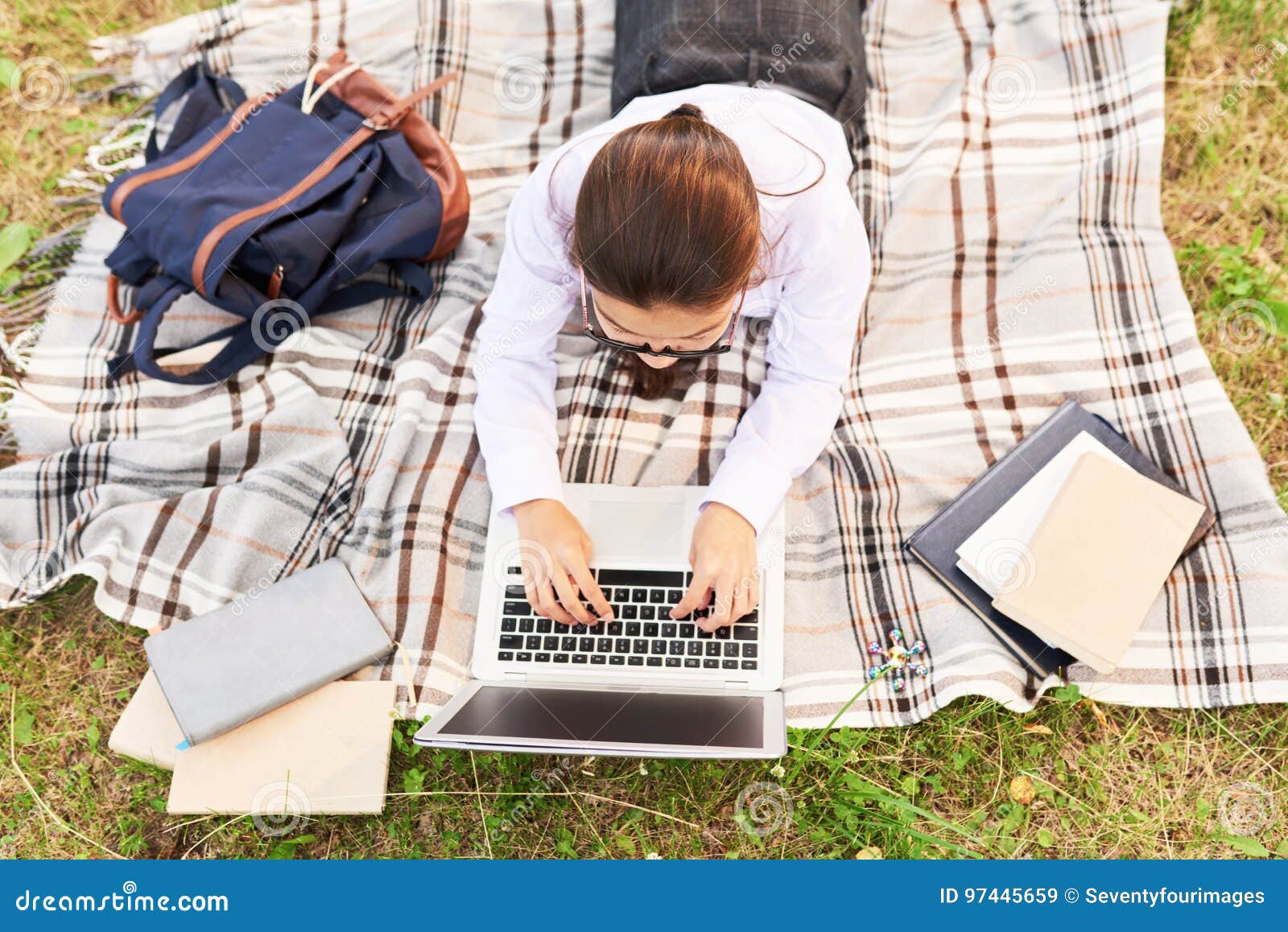 Schoolgirl Doing Homework Outdoors Stock Image - Image of laptop ...