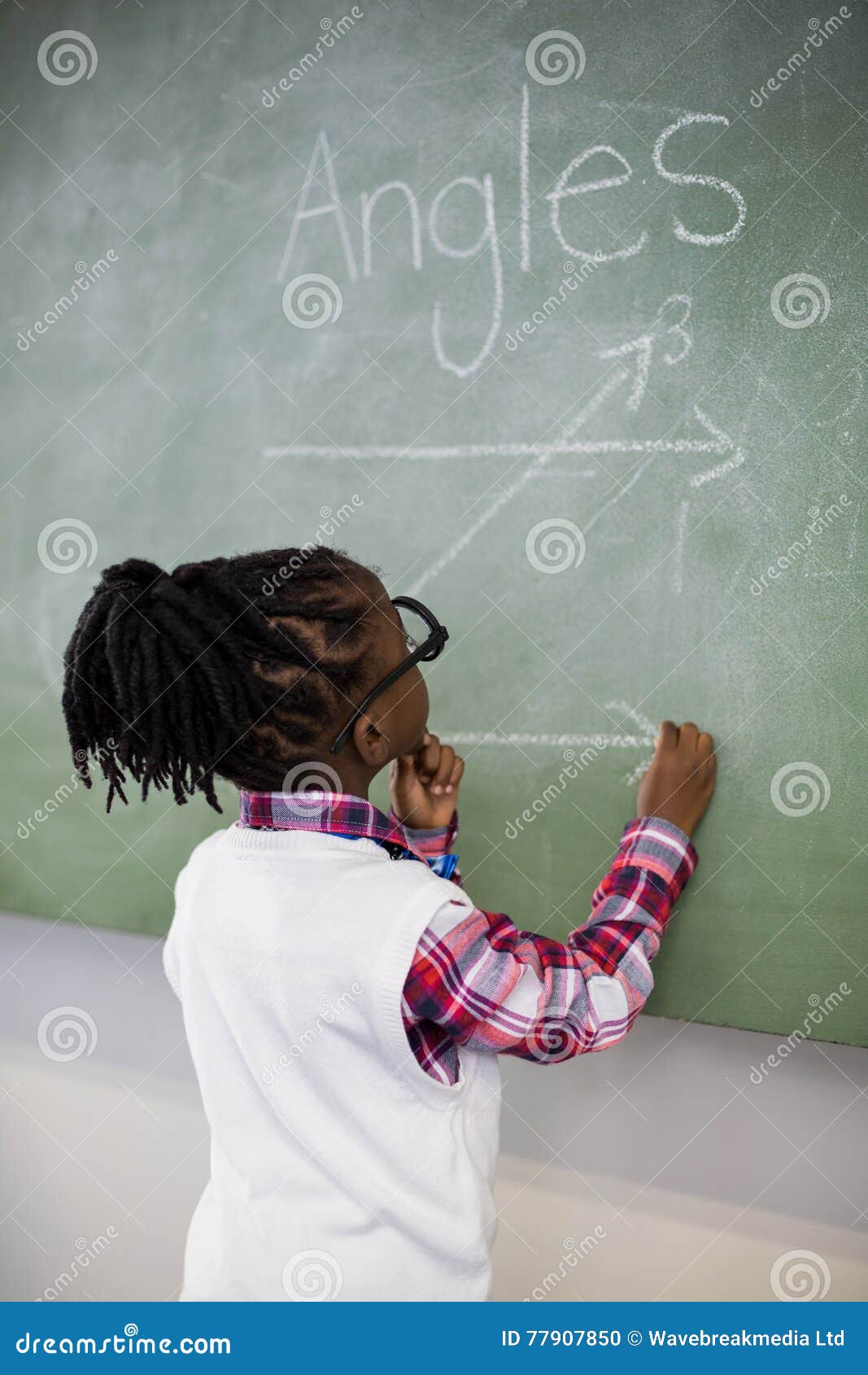 Schoolgirl Doing Mathematics on Chalkboard in Classroom Stock Photo ...