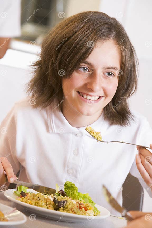 Schoolgirl Enjoying Her Lunch In School Stock Image Image Of Indoors Food 6080911