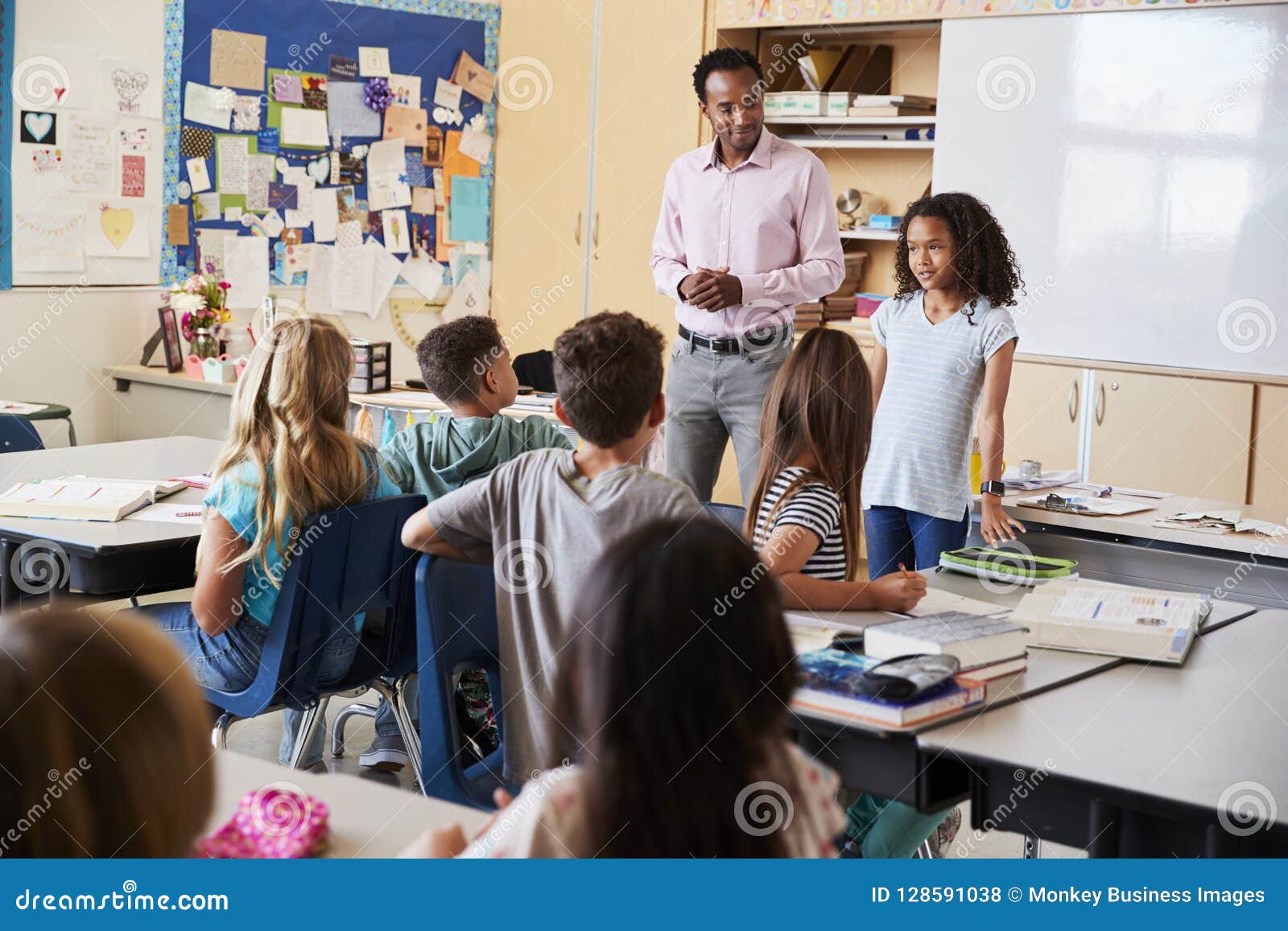Schoolgirl Presenting To Her Elementary School Classmates Stock Photo ...
